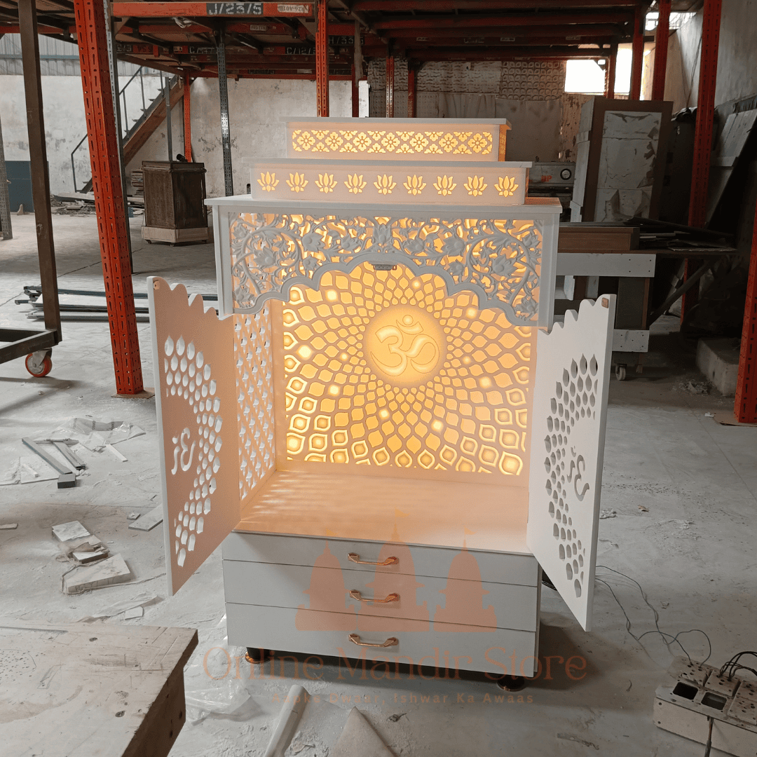 Elegant White Corian Mandir with Folding Doors and Backlit Om Symbol ...
